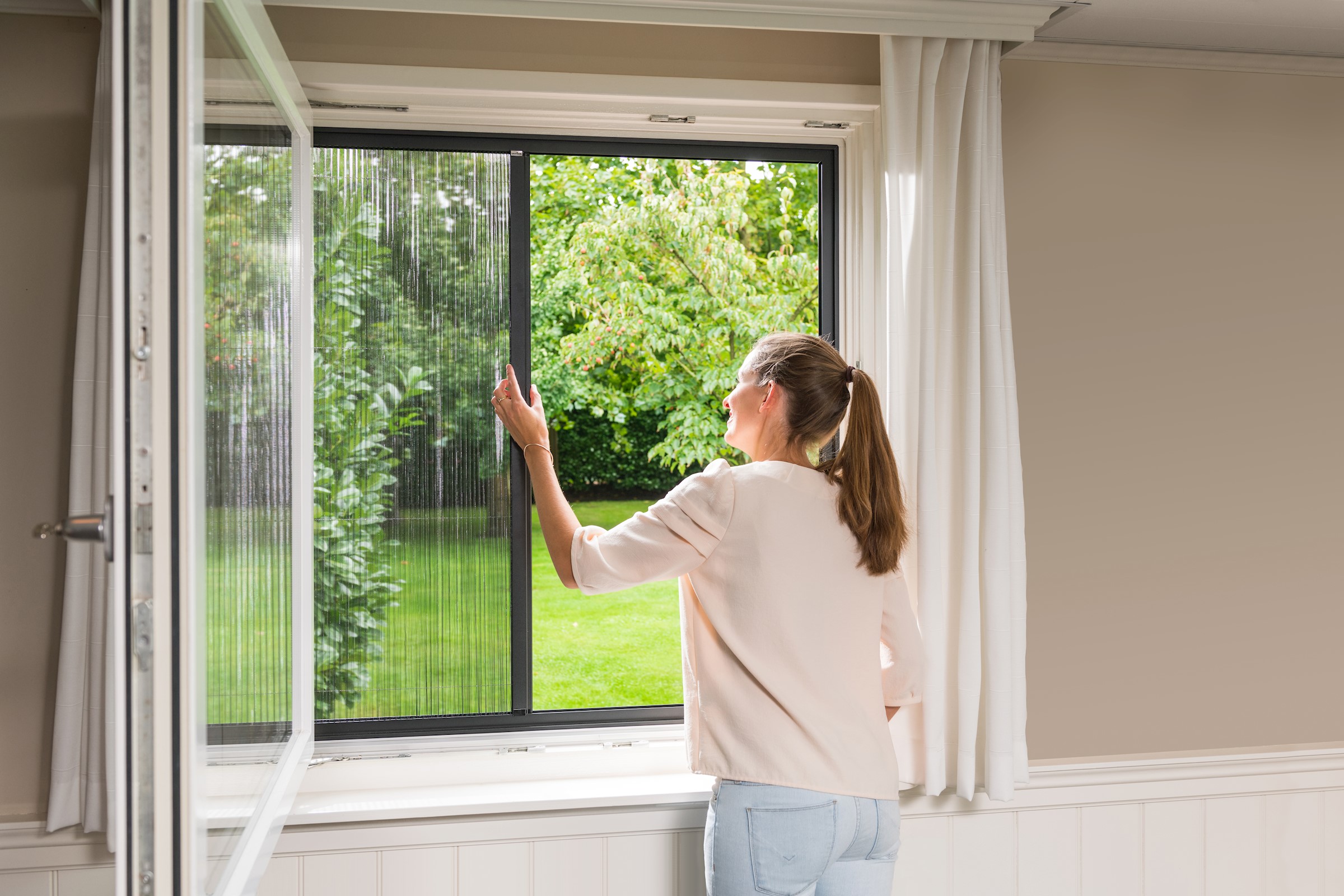 Unilux Plissé Raamhor bij Ambiance